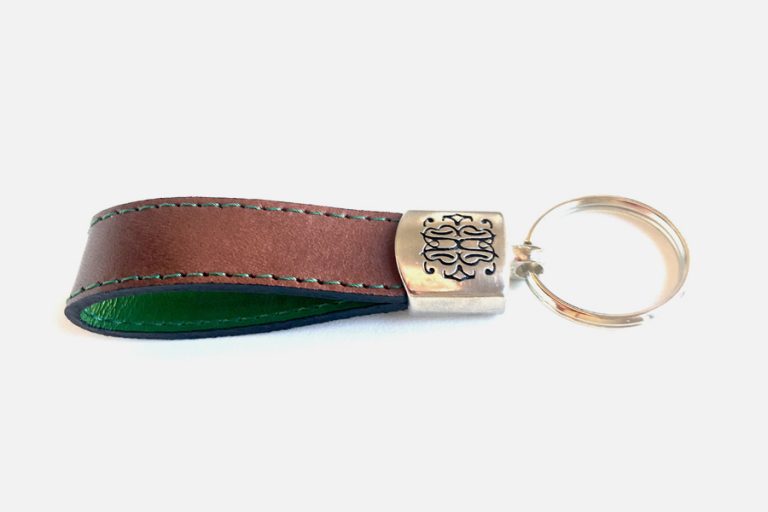 Custom metal and leather keychains - Hotel Gift Selection