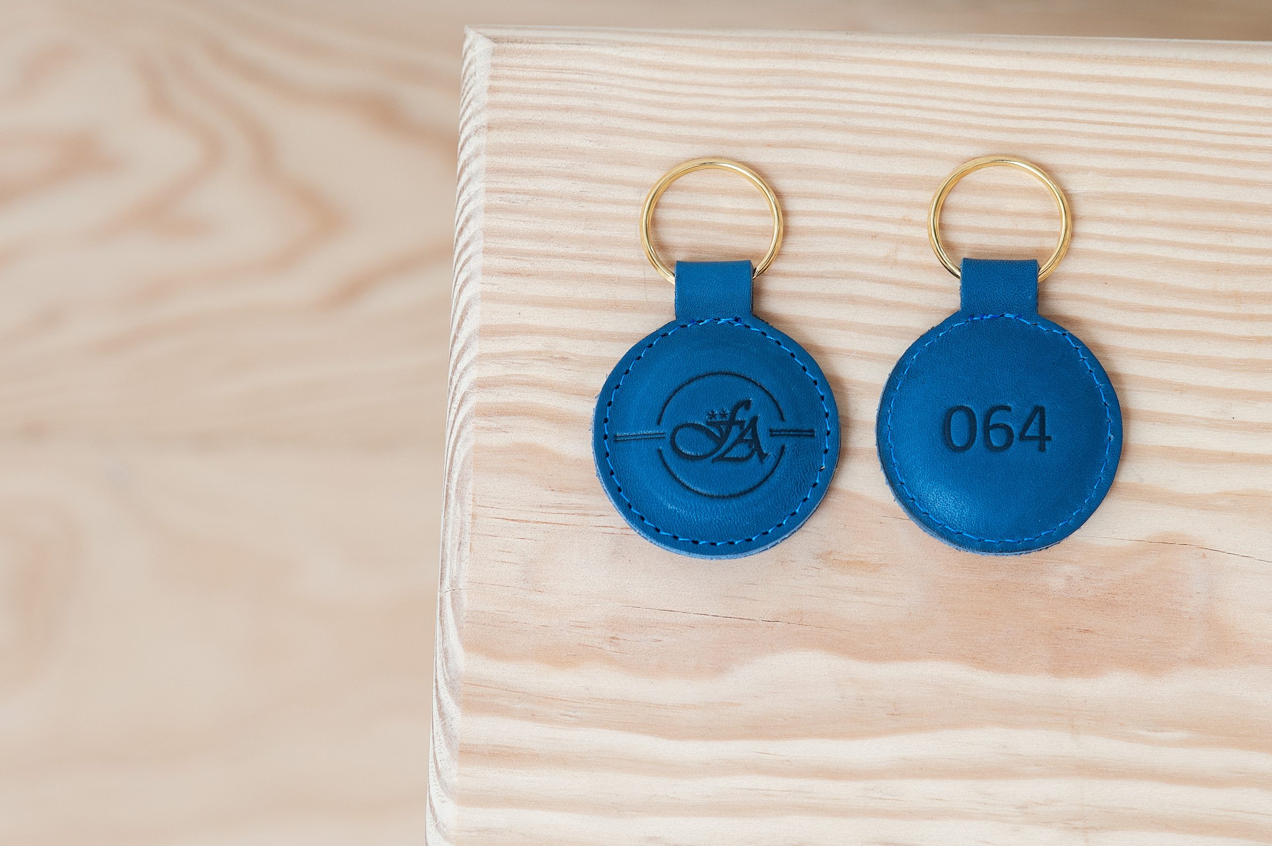 Custom round leather key rings - Hotel Gift Selection
